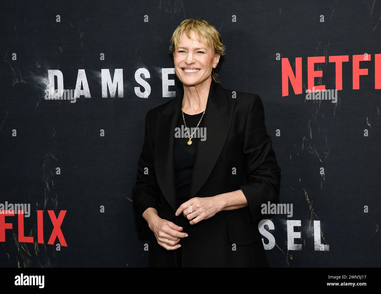 Actor Robin Wright poses at the Netflix "Damsel" photo call at the ...