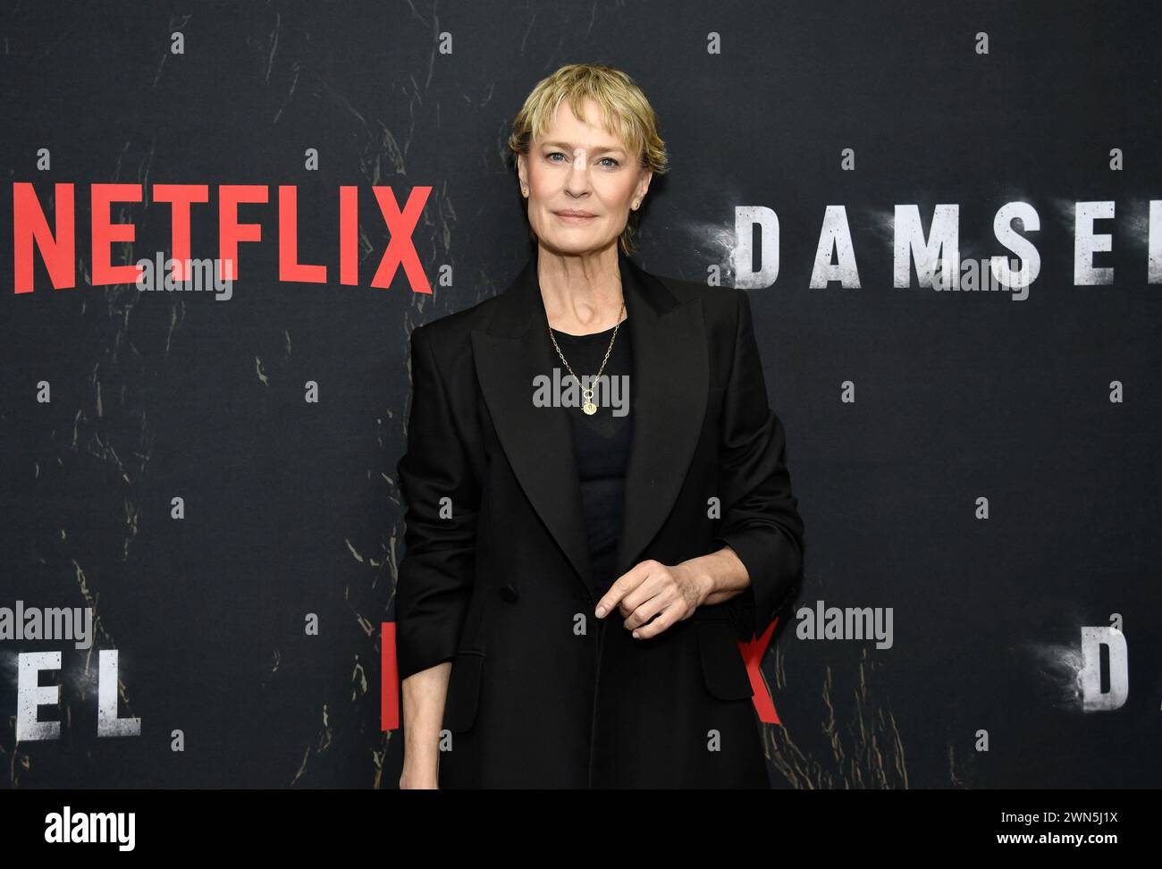 Actor Robin Wright poses at the Netflix "Damsel" photo call at the ...