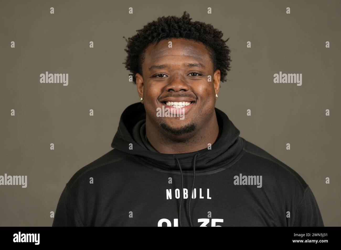 Texas offensive lineman Christian Jones poses for a portrait at the NFL ...