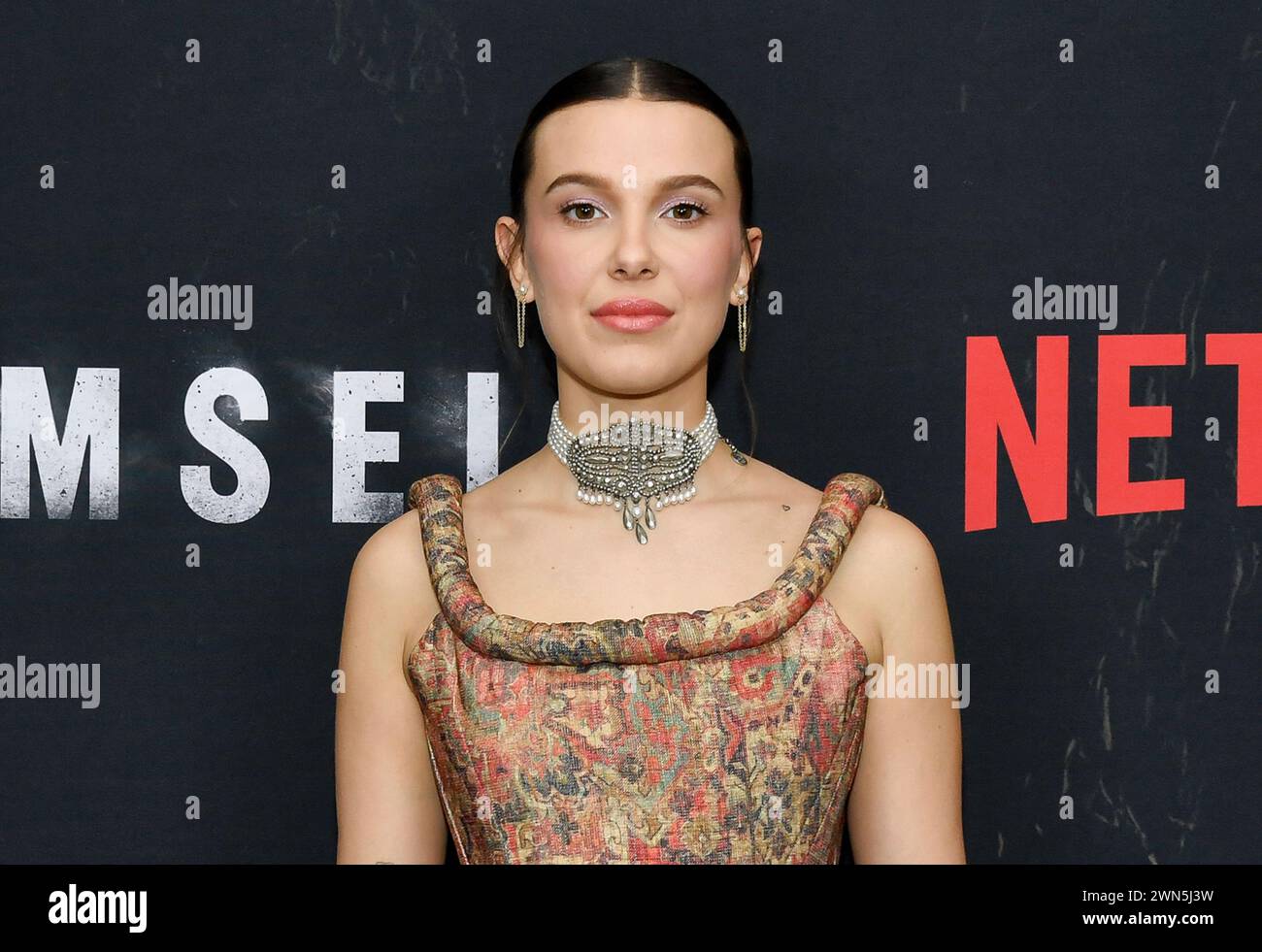 Millie Bobby Brown poses at the Netflix "Damsel" photo call at the ...