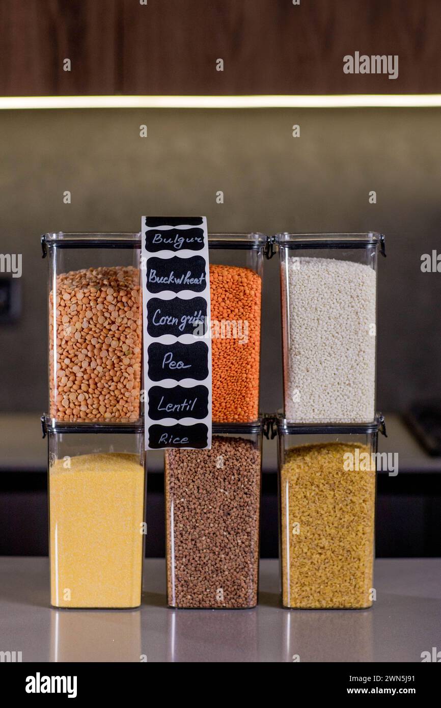 Kitchen storage organization use plastic case. Placing and sorting food ...