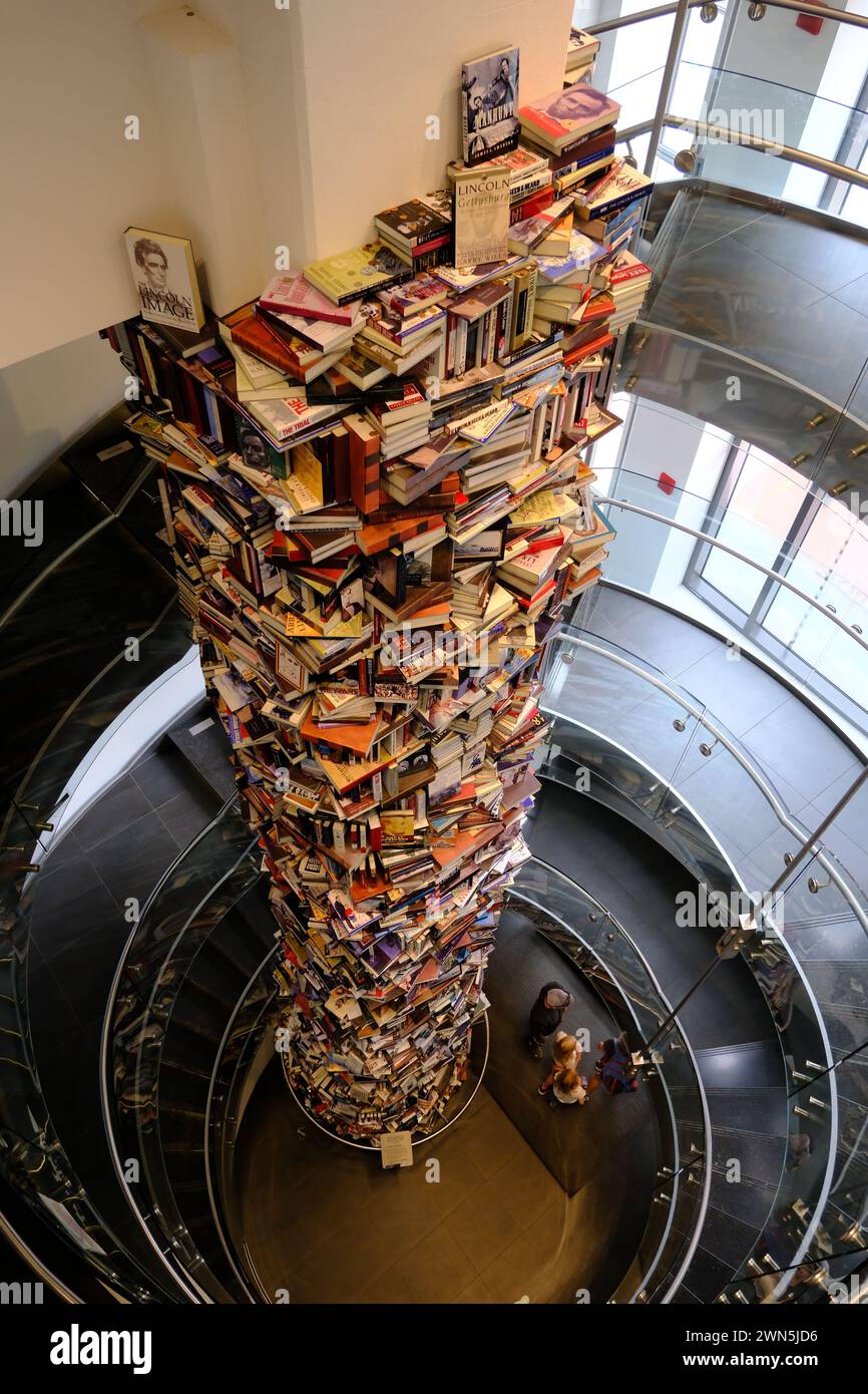 The 34-foot art installation book tower including over 15,000 books ...