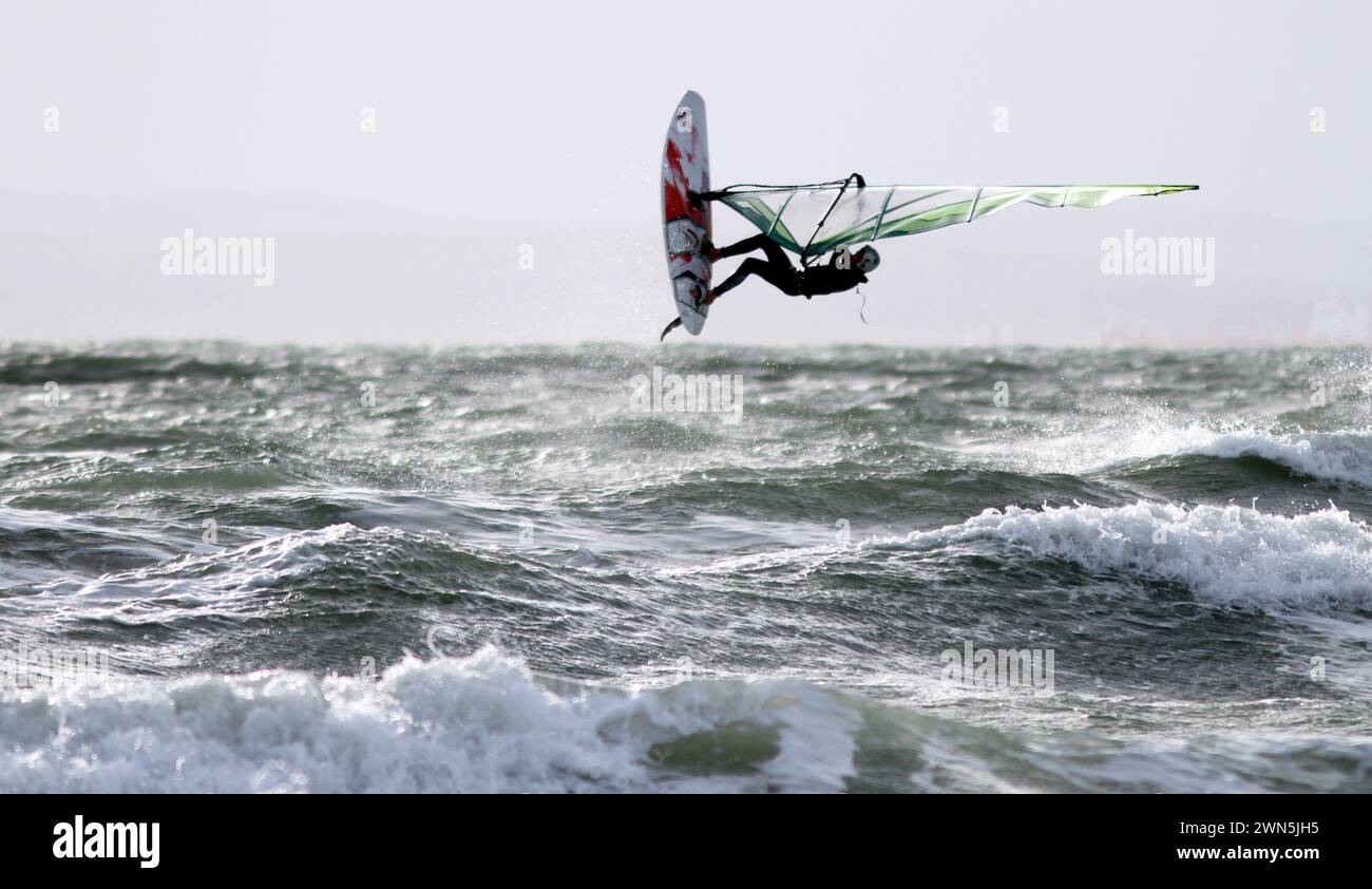 03/11/12 Soren Selter, 14, jumps a wave. With temperatures dropping and ...