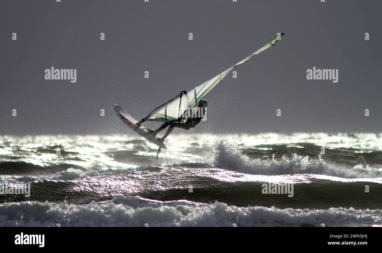 03/11/12 Soren Selter, 14, jumps a wave. With temperatures dropping and ...