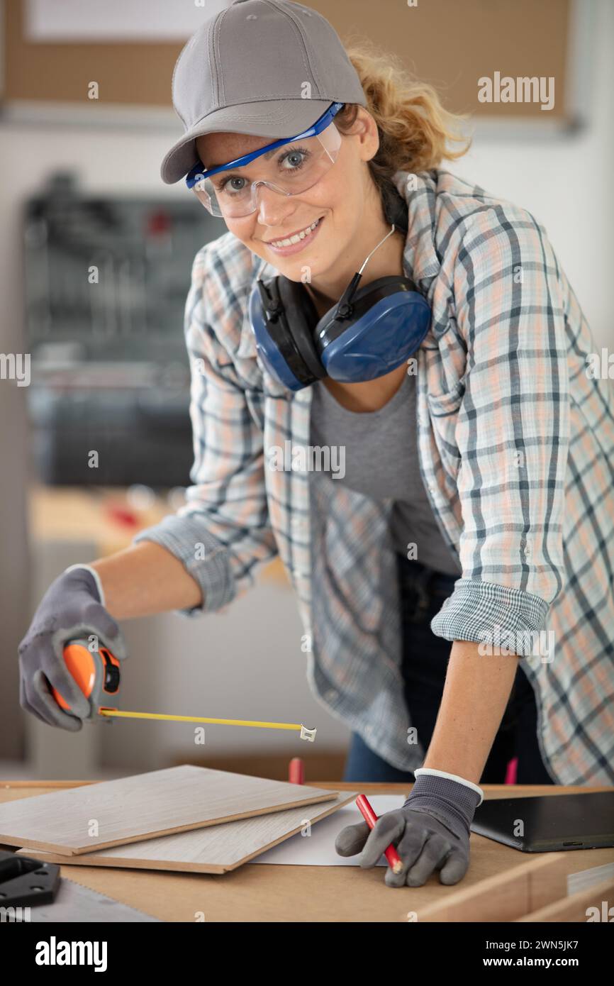 happy attractive hardworking professional female carpenter Stock Photo ...