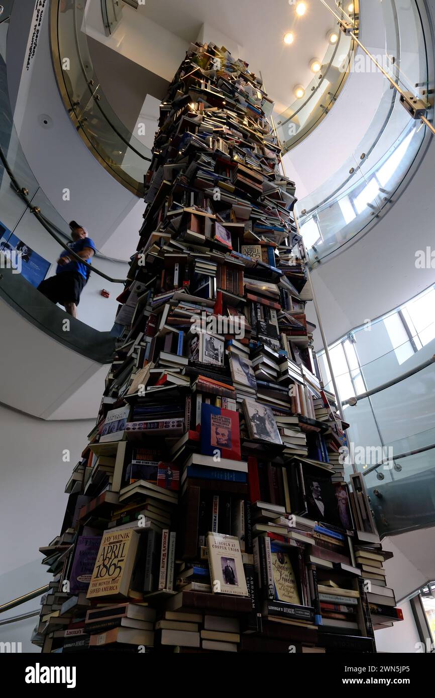 The 34-foot art installation book tower including over 15,000 books ...