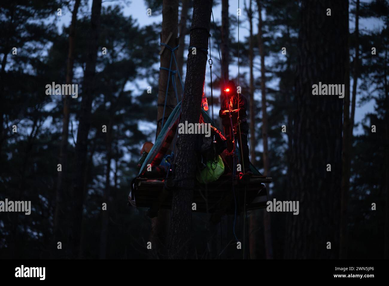 29 February 2024, Brandenburg, Grünheide: An activist from the "Stop ...