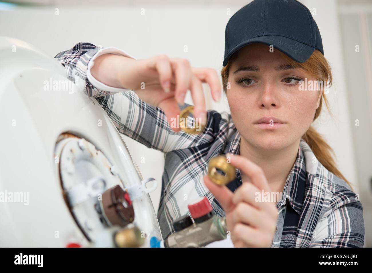 Engineer fixing a boiler hi-res stock photography and images - Alamy