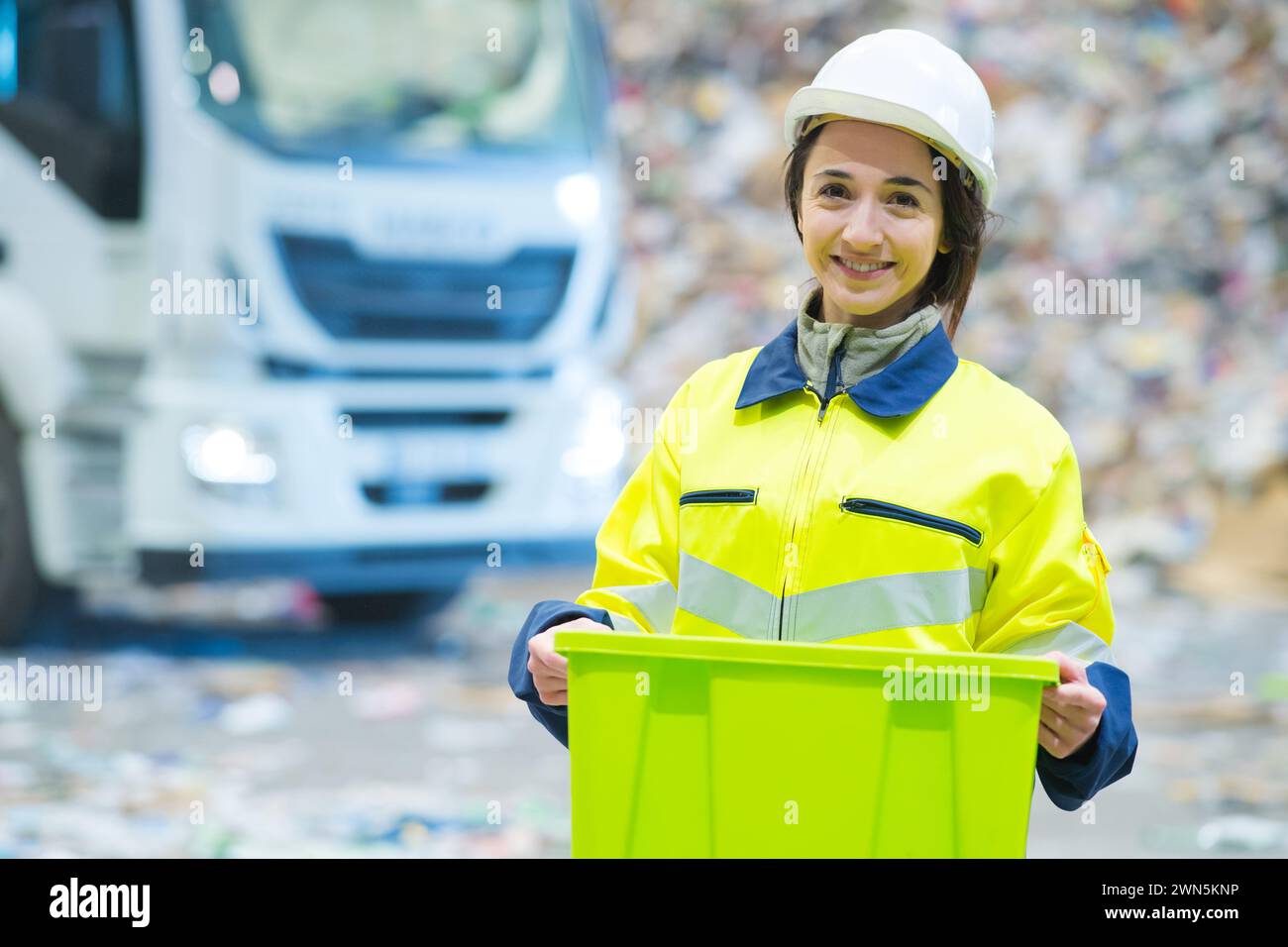 recycling factory site worker smiling Stock Photo - Alamy