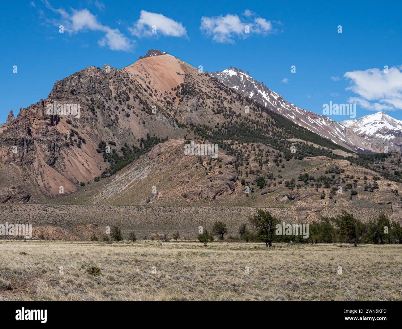 Gravel road from Chile Chico to Jeinimeni NP, snowcovered mountain ...