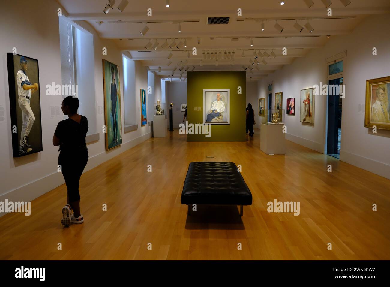 Visitors inside of National Portrait Gallery with the painting of Linus ...