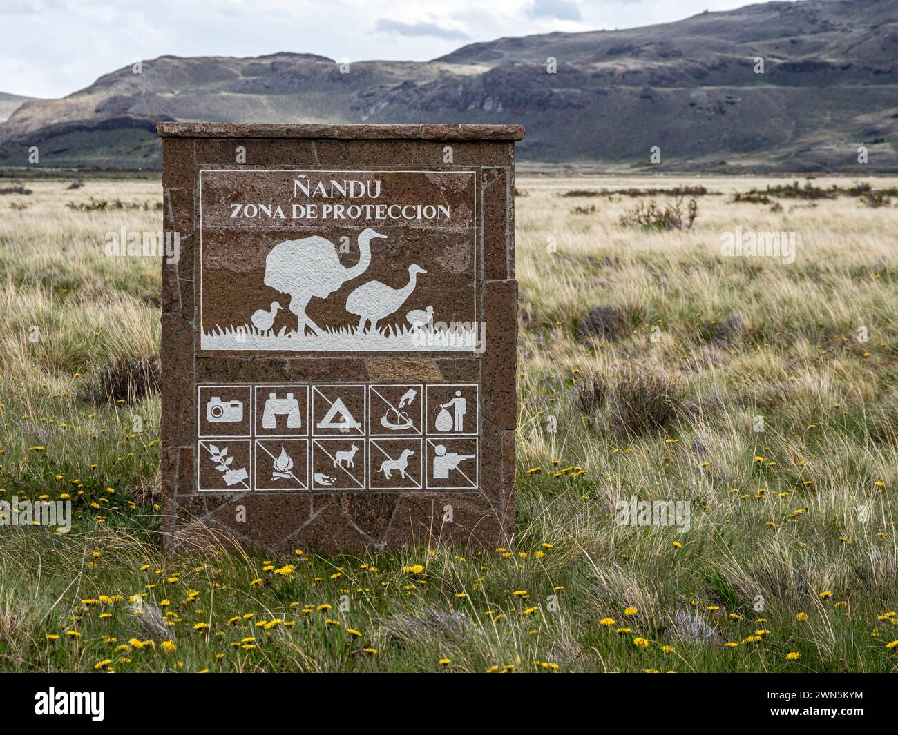 Information sign showing nandu protection zone, valley Valle Chacabuco ...
