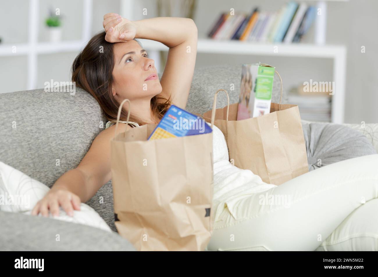 Tired shopper female hi-res stock photography and images - Alamy