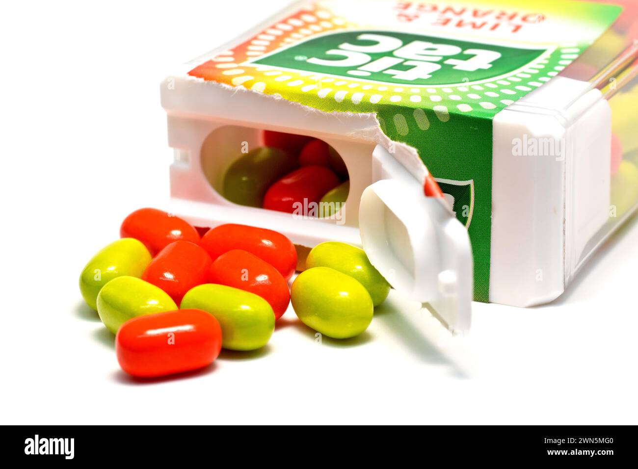 Close up of an opened pack of orange and lime Tic Tac or Tic Tacs, the ...