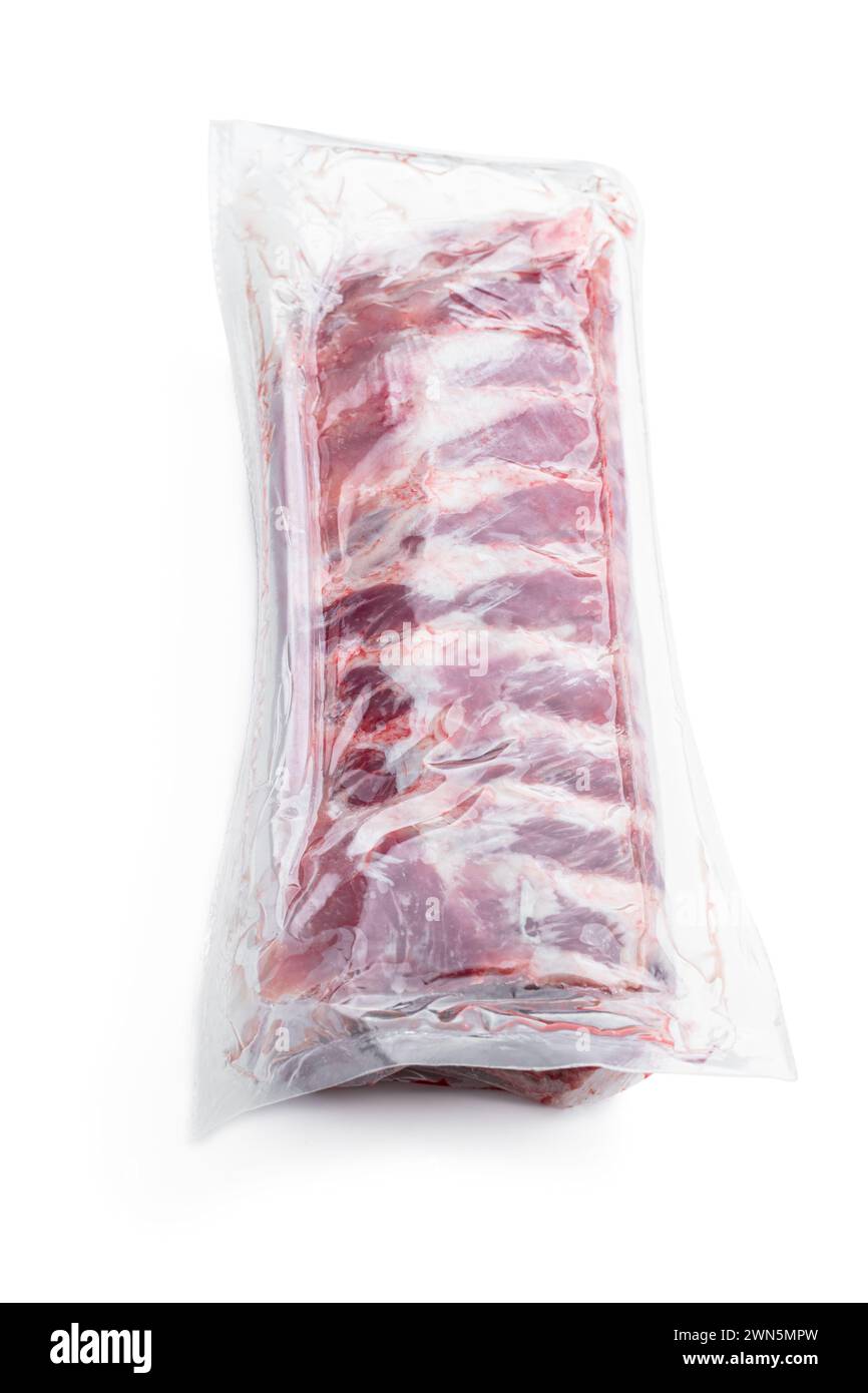Fresh raw pork ribs in a vacuum package isolated on white Stock Photo ...