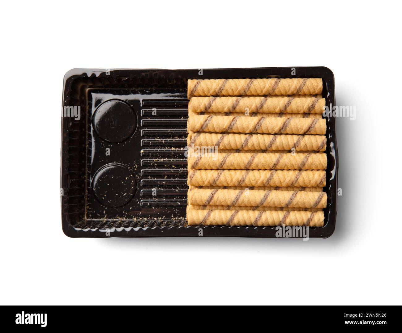 Chocolate crunchy wafer rolls with cream filling in a package isolated ...