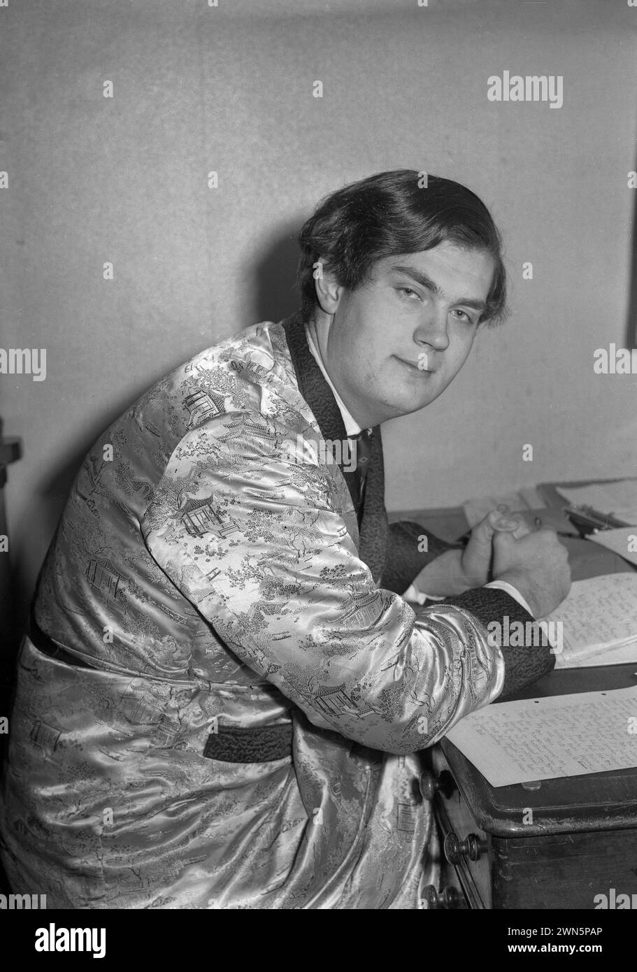Male college student studying at desk Black and White Stock Photos ...