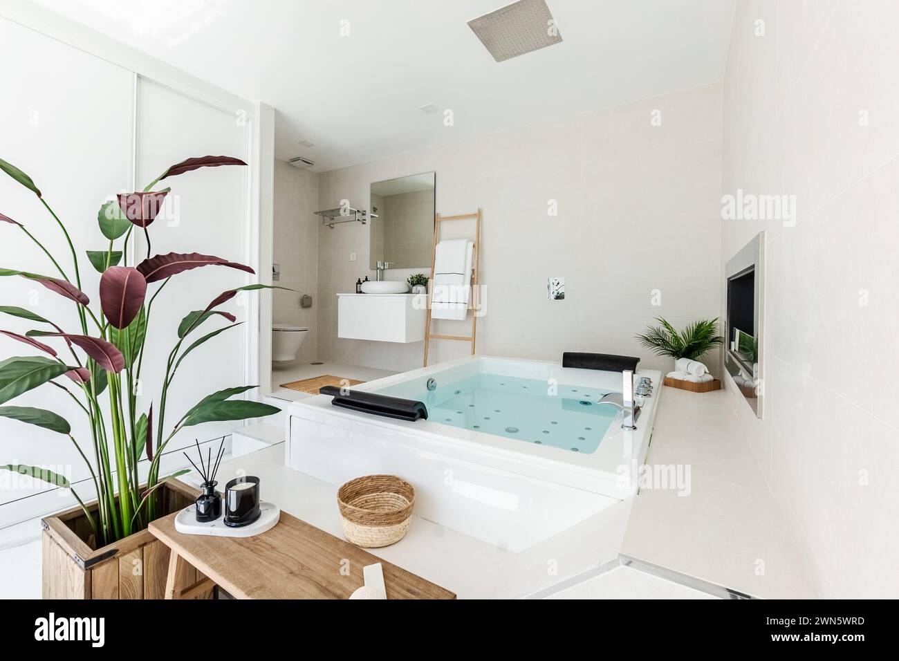 an image of a private double jacuzzi with overhead shower and fireplace ...