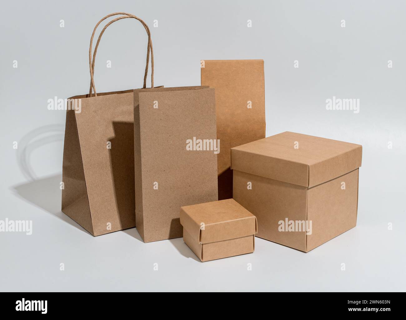 Kraft packages, boxes, bag, brown beige packs for gifts, purchases set ...