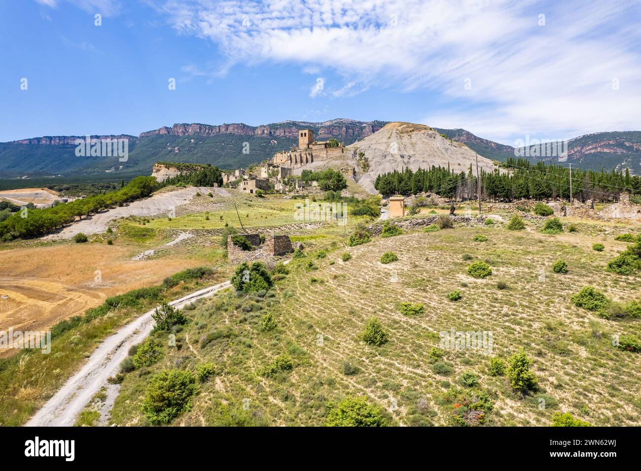 Aerial view of ruins of village of Escó by Yesa reservoir in Spain ...