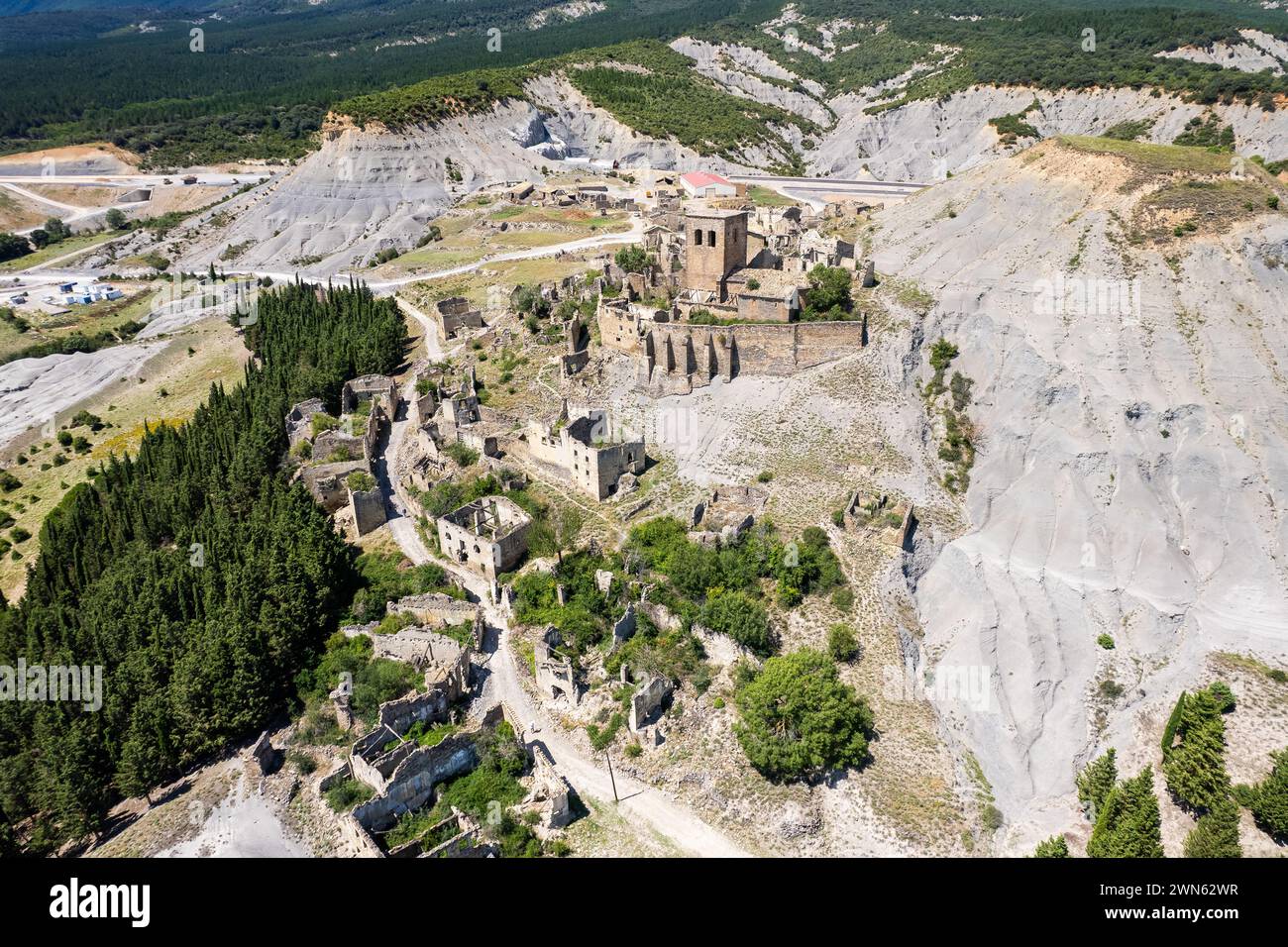 Aerial view of ruins of village of Escó by Yesa reservoir in Spain ...