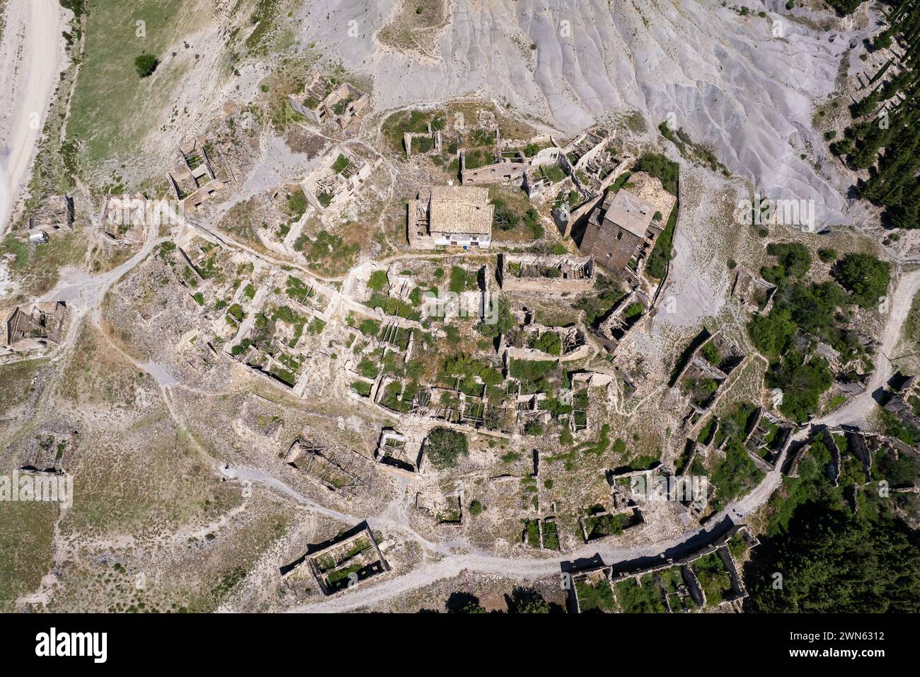Aerial view of ruins of village of Escó by Yesa reservoir in Spain ...