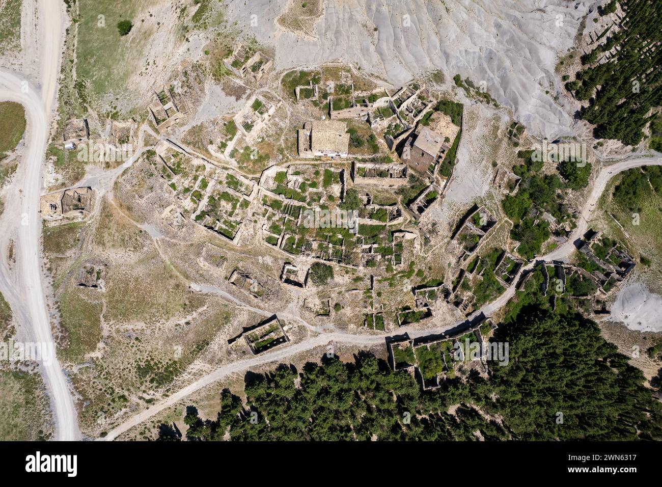 Aerial view of ruins of village of Escó by Yesa reservoir in Spain ...
