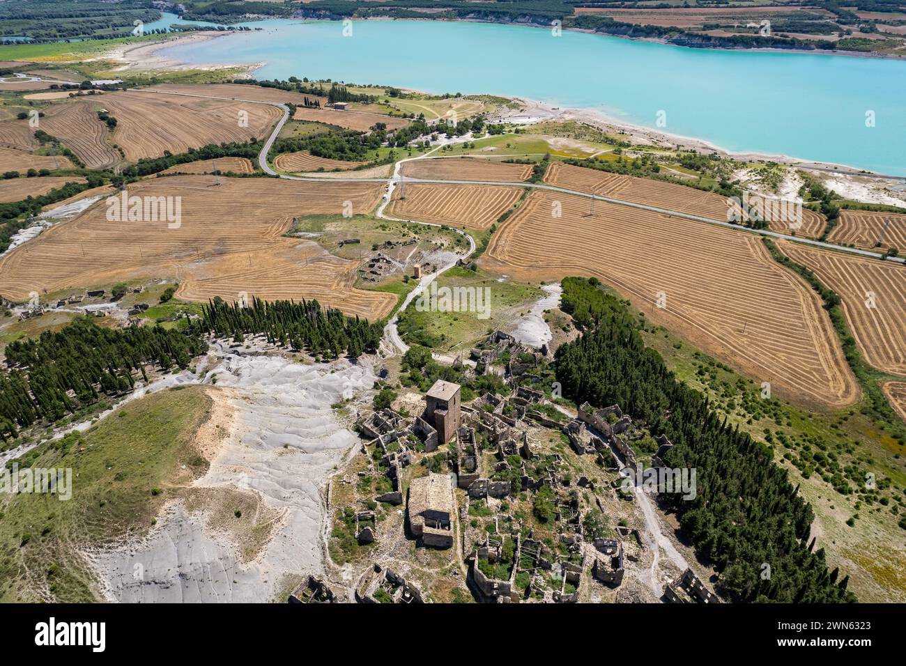 Aerial view of ruins of village of Escó by Yesa reservoir in Spain ...