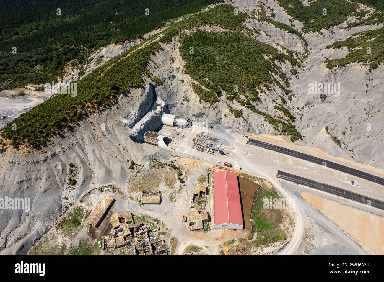 Aerial view of highway A-21 built by ruins of village of Escó by Yesa ...