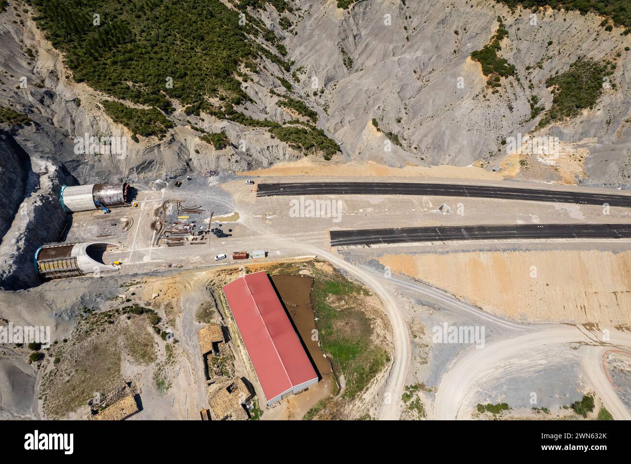 Aerial view of highway A-21 built by ruins of village of Escó by Yesa ...