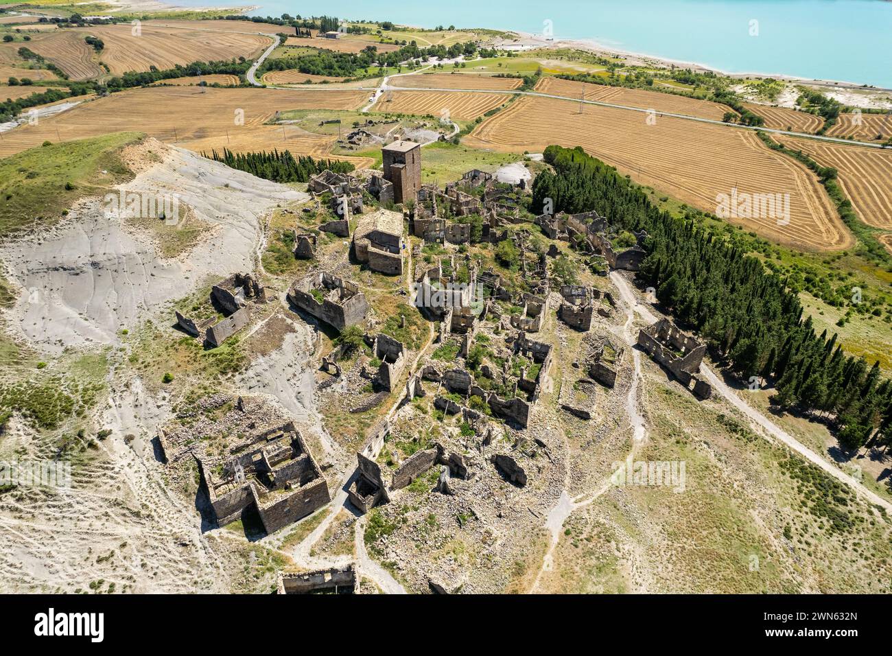 Aerial view of ruins of village of Escó by Yesa reservoir in Spain ...