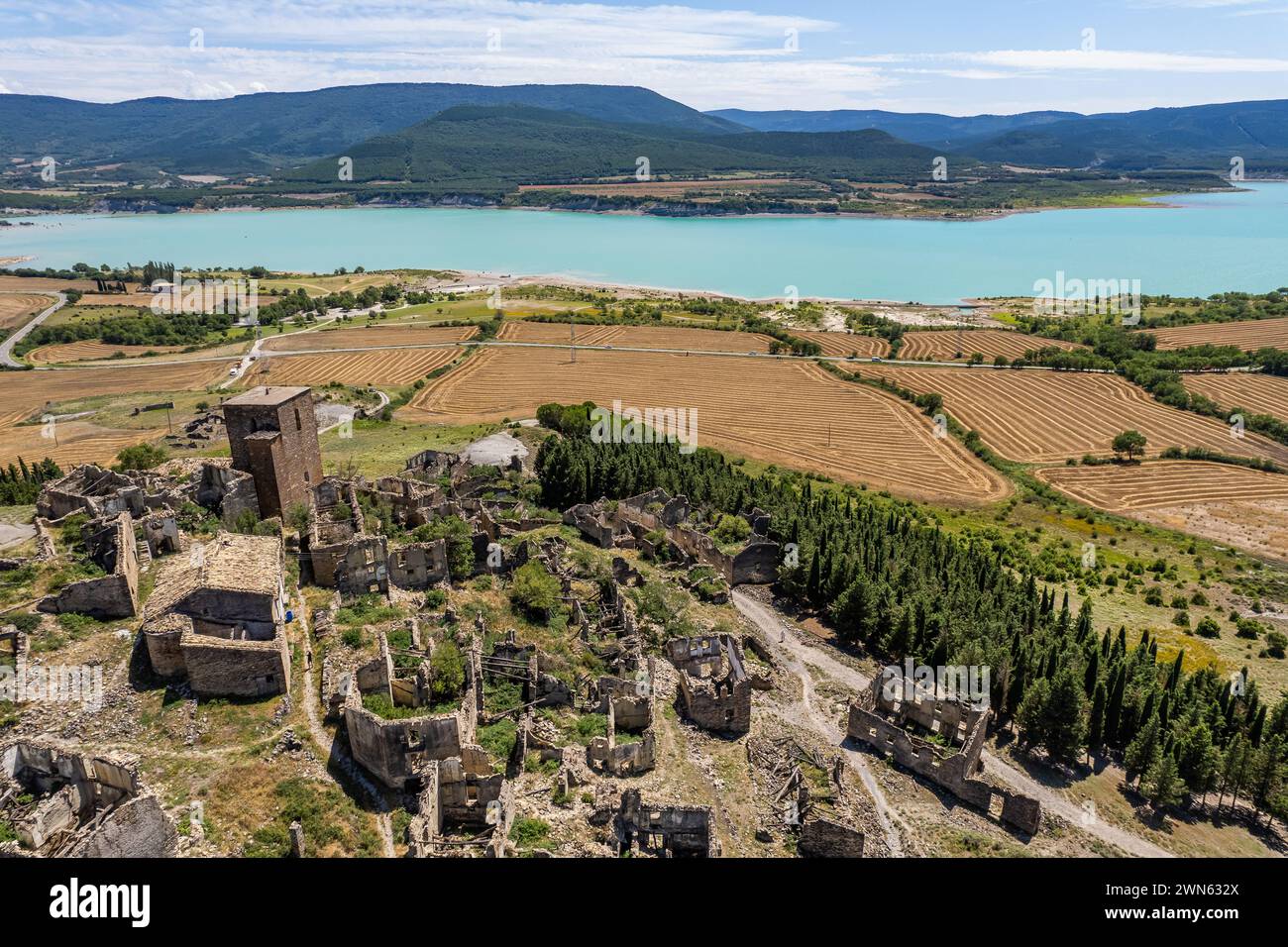 Aerial view of ruins of village of Escó by Yesa reservoir in Spain ...
