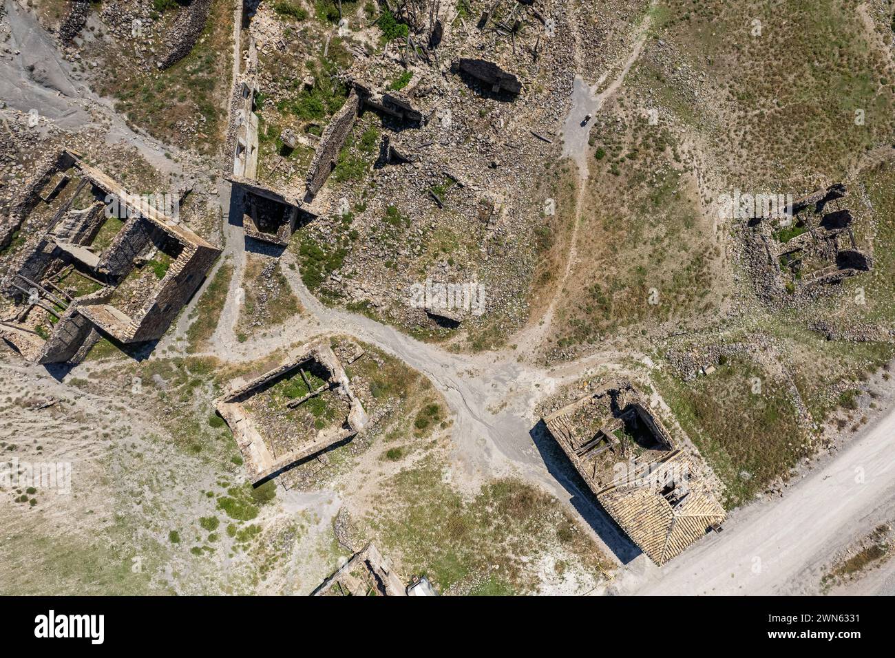 Aerial view of ruins of village of Escó by Yesa reservoir in Spain ...