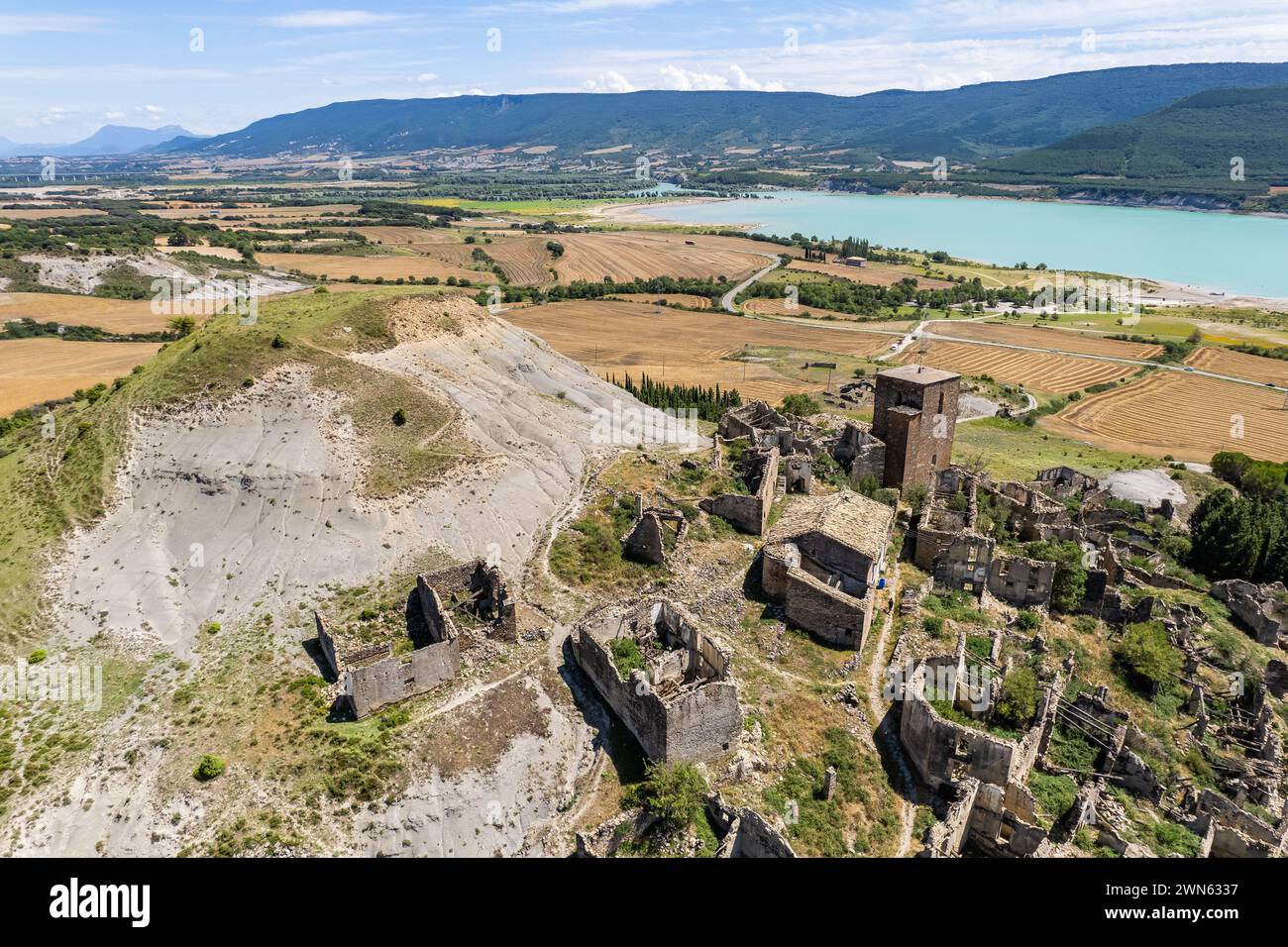 Aerial view of ruins of village of Escó by Yesa reservoir in Spain ...