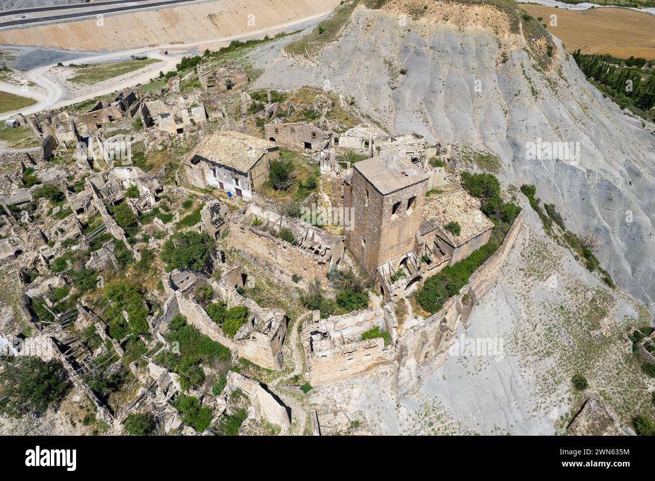 Aerial view of ruins of village of Escó by Yesa reservoir in Spain ...