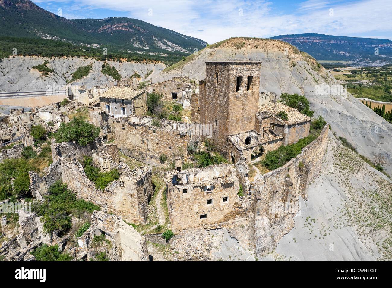 Aerial view of ruins of village of Escó by Yesa reservoir in Spain ...