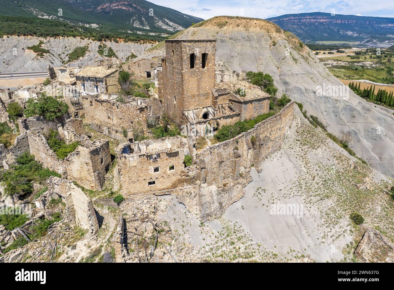 Aerial view of ruins of village of Escó by Yesa reservoir in Spain ...