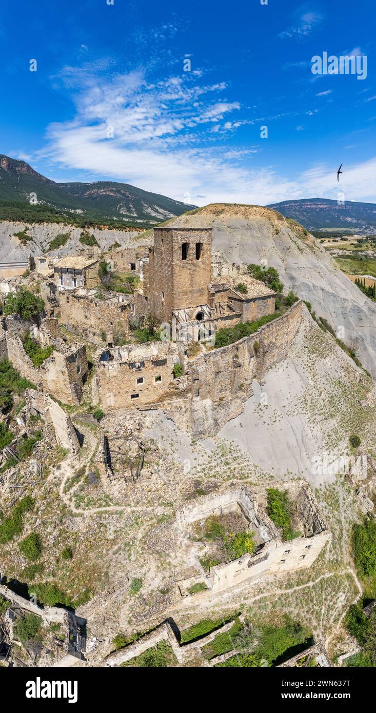 Aerial view of ruins of village of Escó by Yesa reservoir in Spain ...