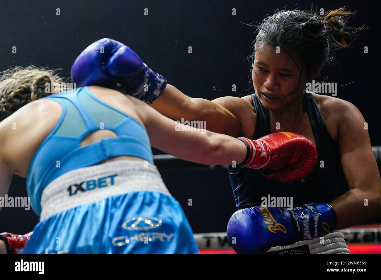 Bangkok, Thailand. 29th Feb, 2024. Angelina Lukas (L) lands a punch on ...