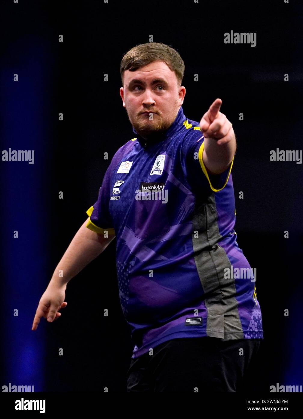 Luke Littler celebrates during his match against Michael Smith (not ...