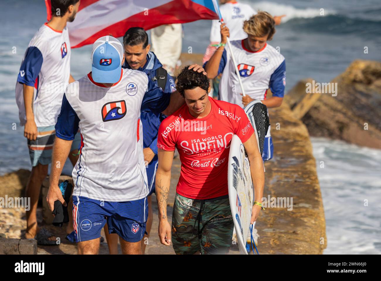 Dwight Pastrana from Puerto Rico carries his board after competing in ...