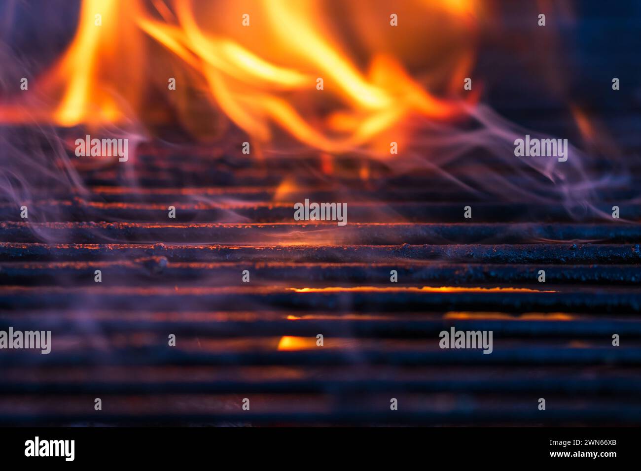 Empty hot charcoal barbecue grill with bright flame Stock Photo - Alamy