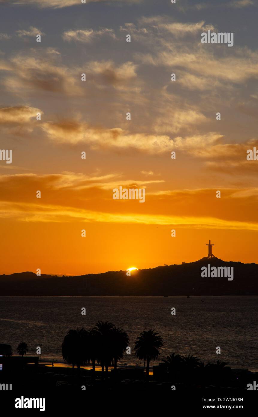 sunset scene in Coquimbo, Chile. The Cross of Third Millenium at the ...