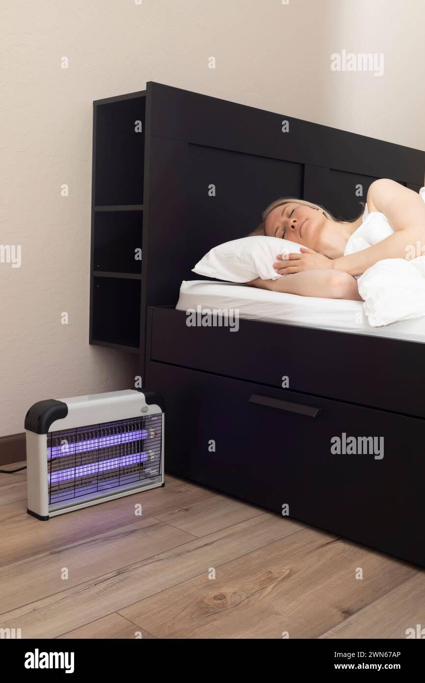 Electric Mosquito or Insect Zapper With Blue Purple Lights Turned on ...