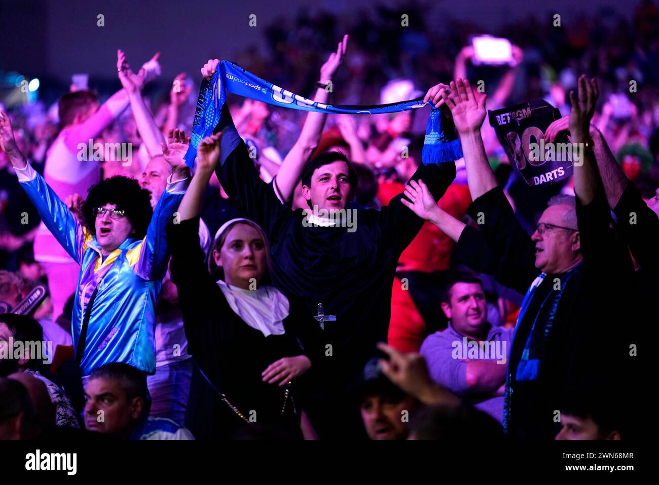 Spectators in fancy dress during night five of the 2024 BetMGM Premier ...