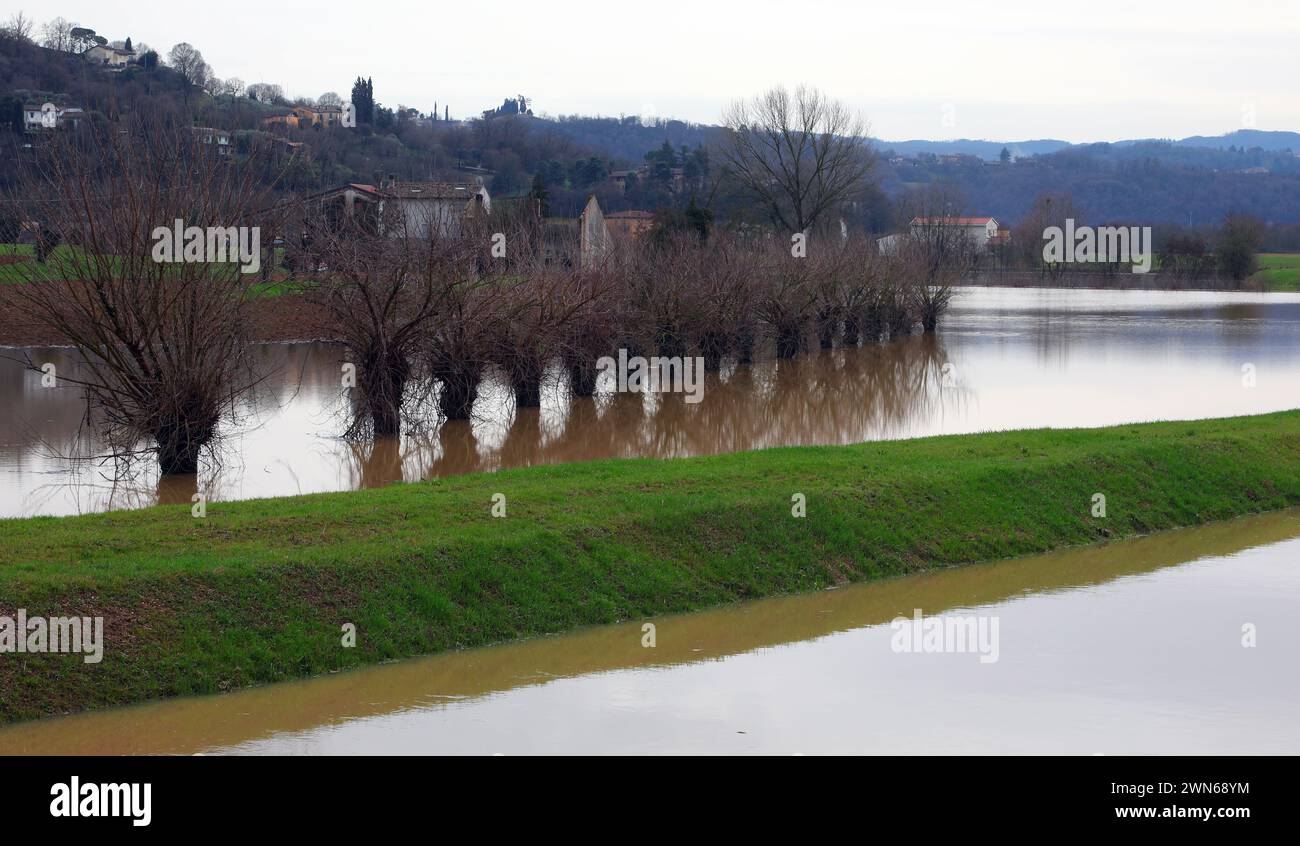 river overflowed due to the incessant rain and the countryside with its ...