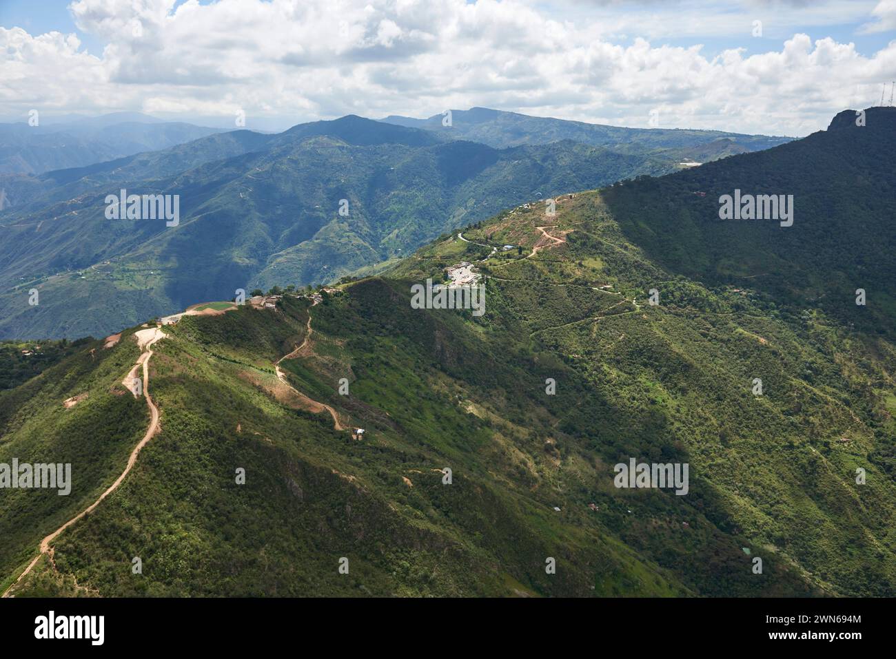 Aerial view, from a paraglider, of a mountainous Andean landscape in ...