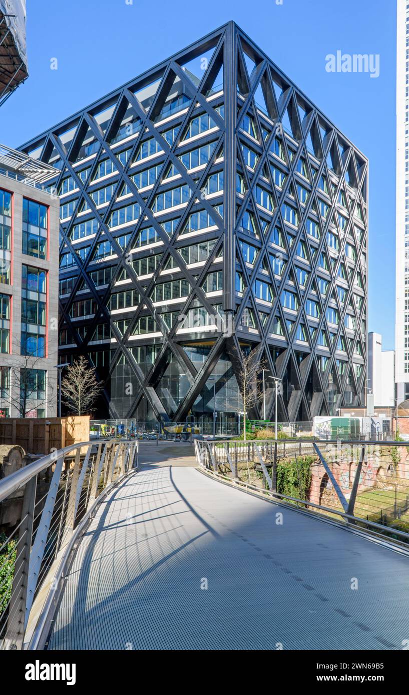 The No.4 New Bailey office building from the river Irwell footbridge ...