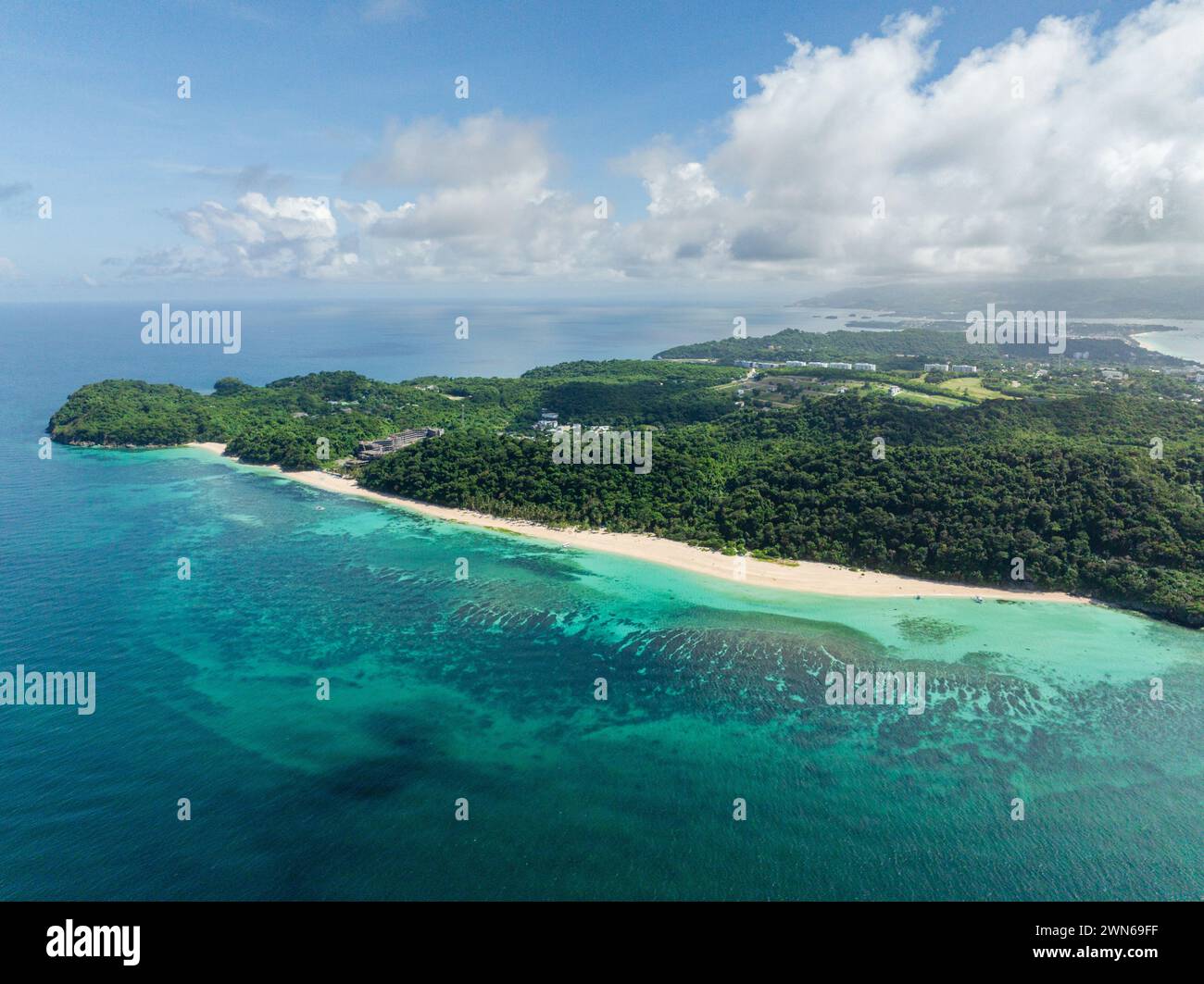 Clear water over the coral reefs. White sand in Puka Shell Beach ...
