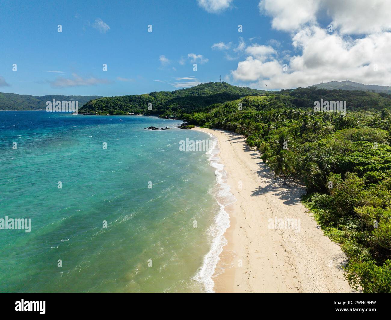 Turquoise sea waves on white sands in Bon Bon Beach. Romblon Island ...